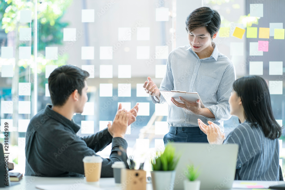 Corporate business team .clap the hands and celebrate in conference ...