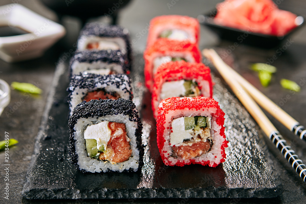 Macro photo of maki sushi roll with rice, cream cheese, salmon, eel ...