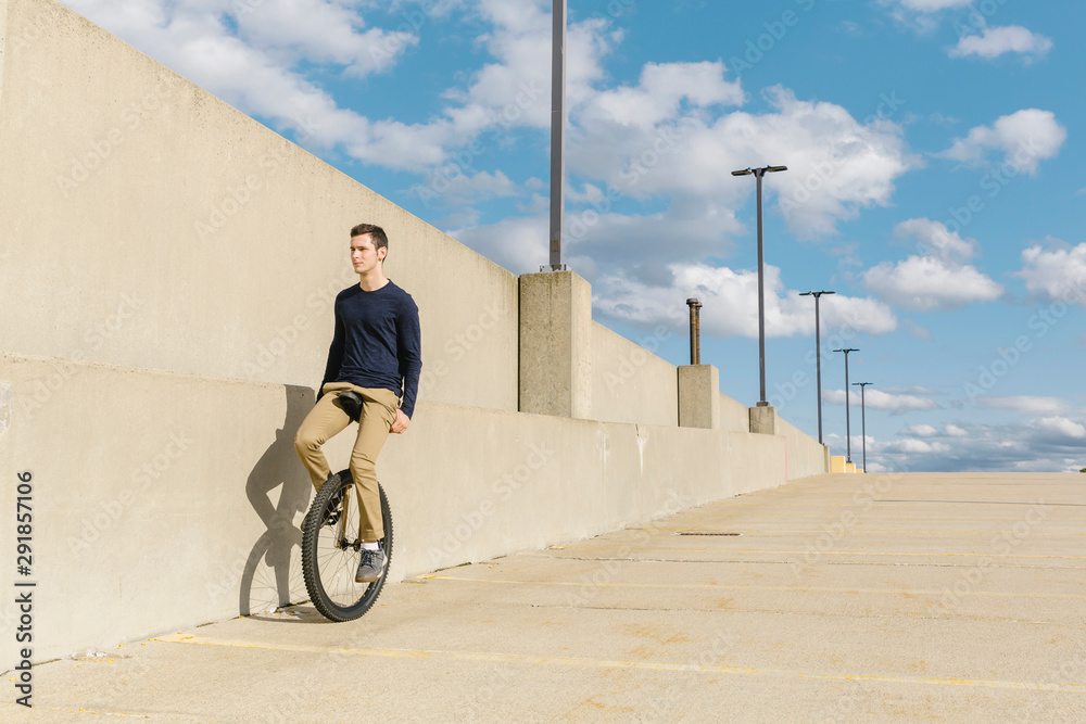 One Wheel Bicycle Stock Photo | Adobe Stock
