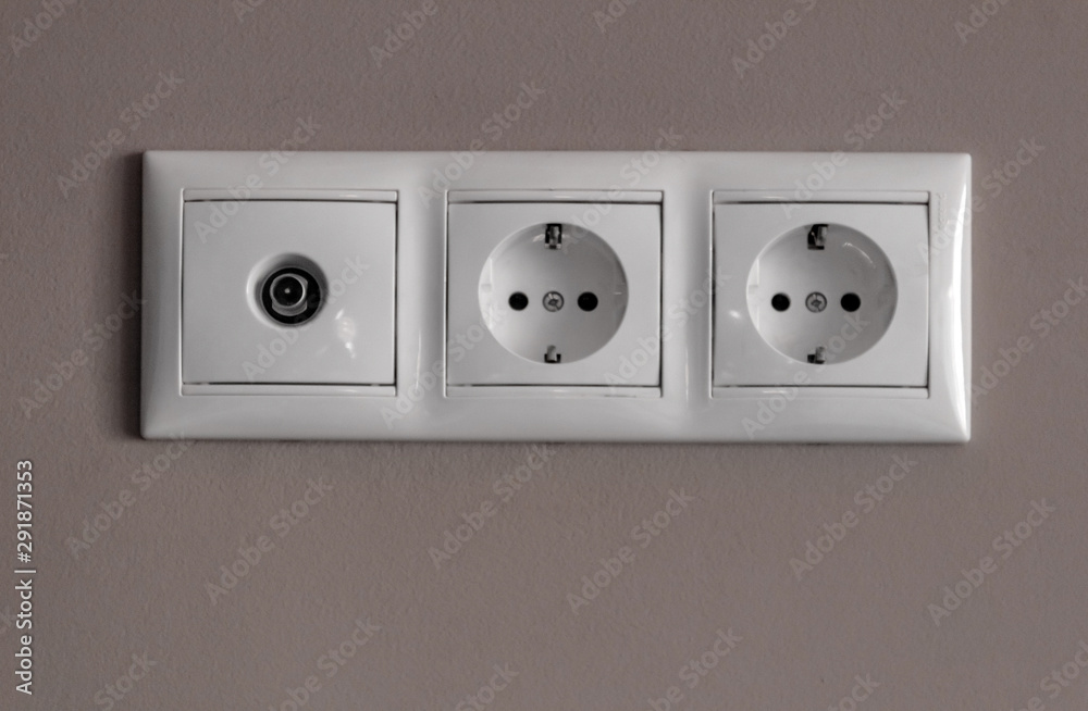 electrical outlets, a set of three white empty electrical sockets for ...