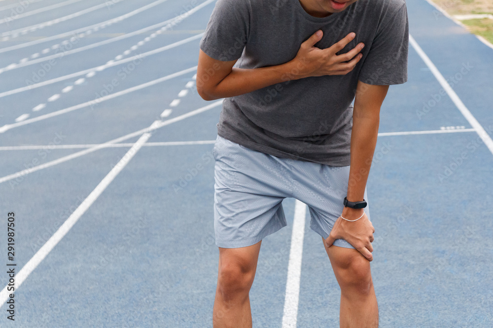 Sport man suffering from chest pain heart attack after running ...