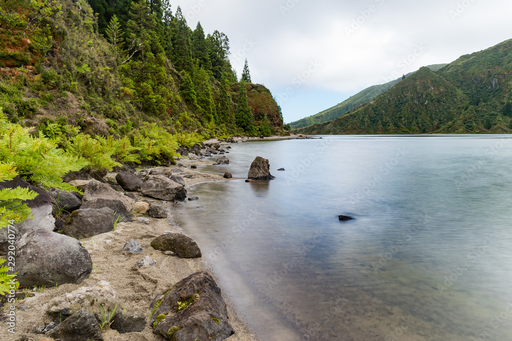 View from the waterside of Lagoa do Fogo, a crater lake on the island ...