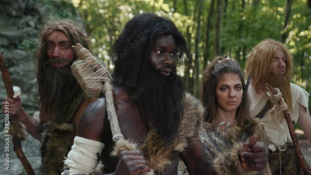 Neanderthal african family of hunter-gatherers staying in group hunting ...