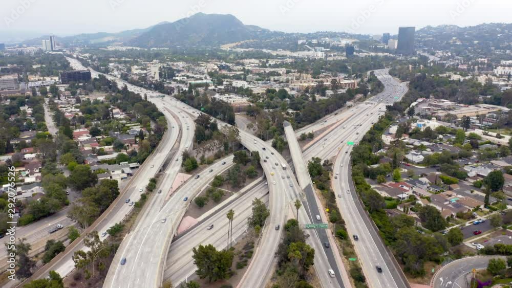 4K. Zooming out aerial shooting of Los Angeles. The view of a freeway ...