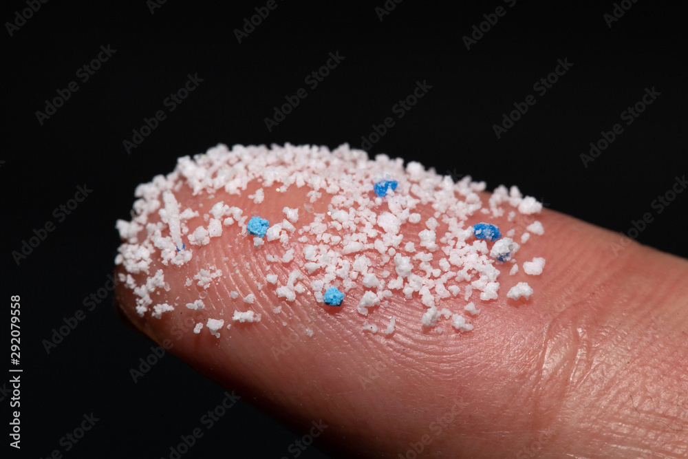 Micro plastic.Small Plastic pellets on the finger. foto de Stock ...