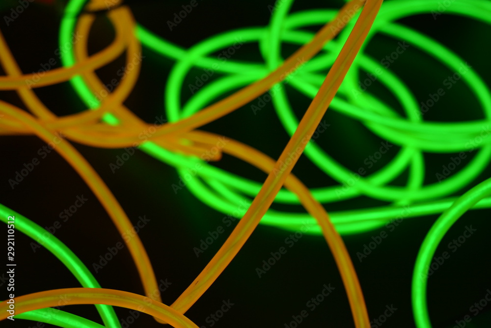 Bright luminous yellow and green, lime neon wires in different formats ...