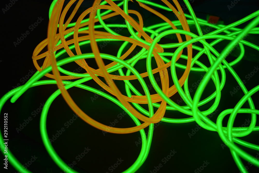 Bright luminous yellow and green, lime neon wires in different formats ...