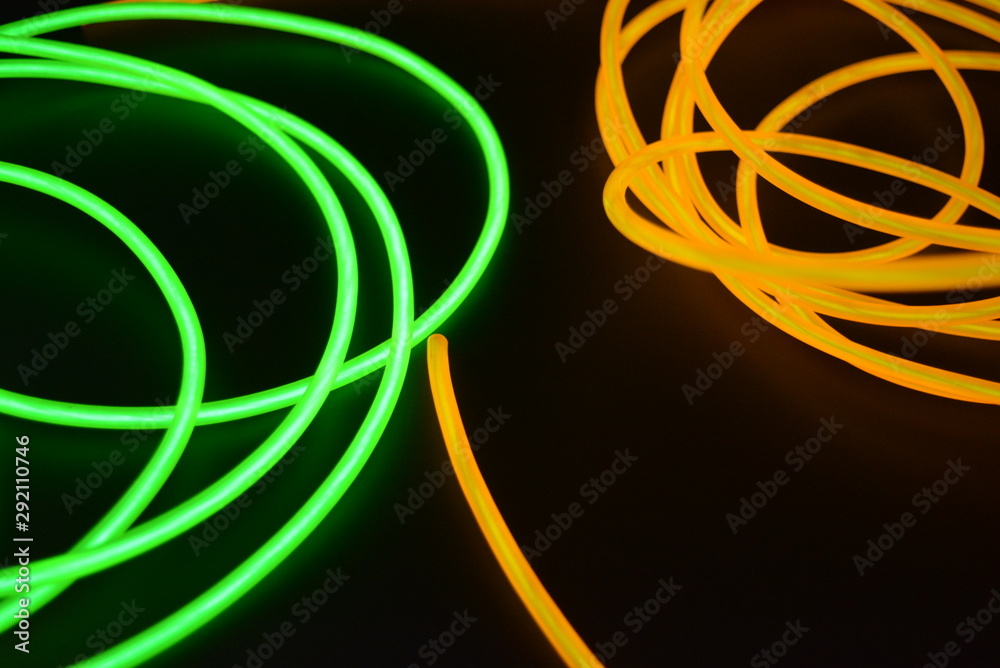 Bright luminous yellow and green, lime neon wires in different formats ...