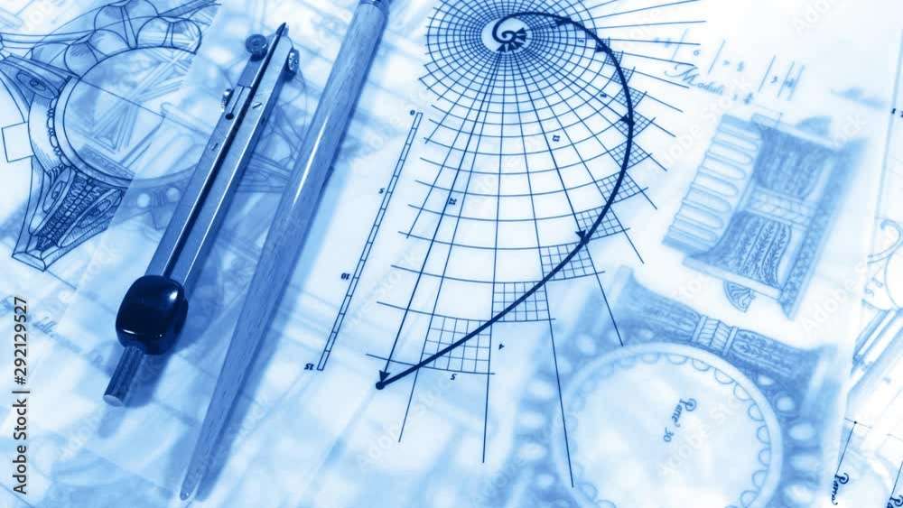 Blueprints - rolls of architectural drawings, compass and drawing of ...