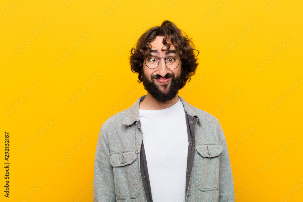 Foto de young crazy man looking goofy and funny with a silly cross-eyed ...