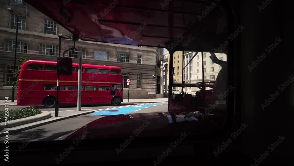 Passenger pov double deck routemaster bus downtown London, black taxis ...