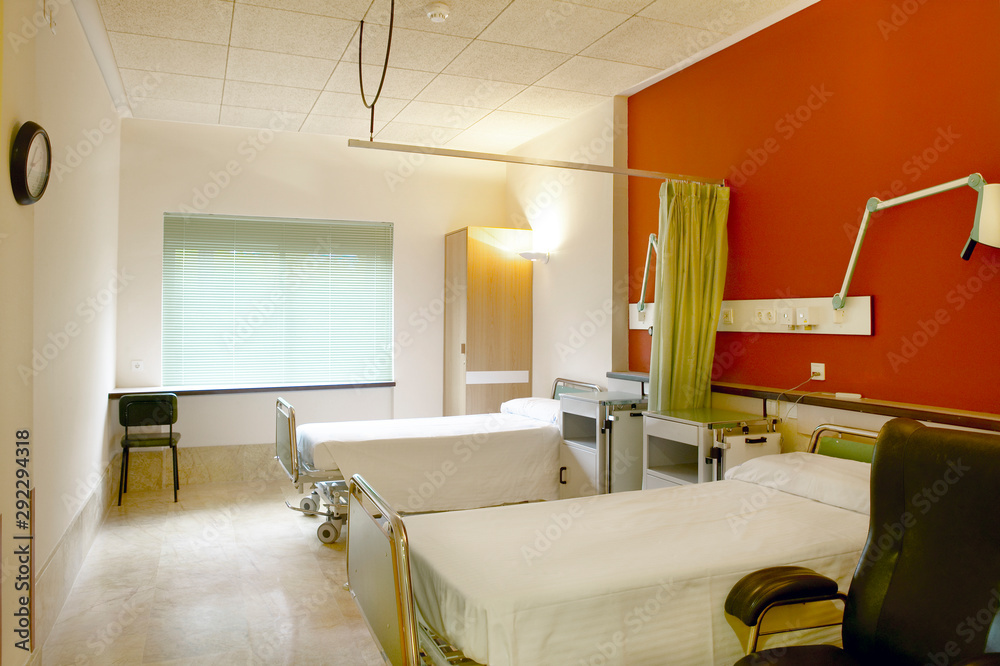 Hospital room interior with two separated beds. Healthcare treatment ...