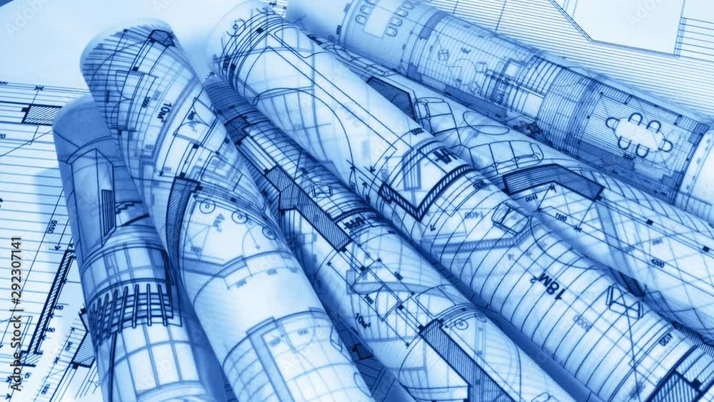 Blueprints - rolls of architectural drawings smoothly rotate on the ...