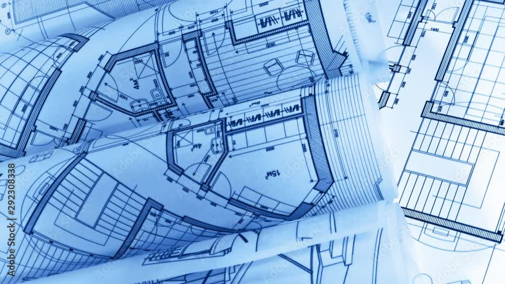 Blueprints - rolls of architectural drawings smoothly rotate on the ...