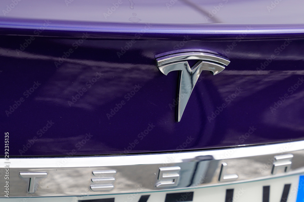 Tesla logo on Model car sign Tesla Motors Inc American company electric ...