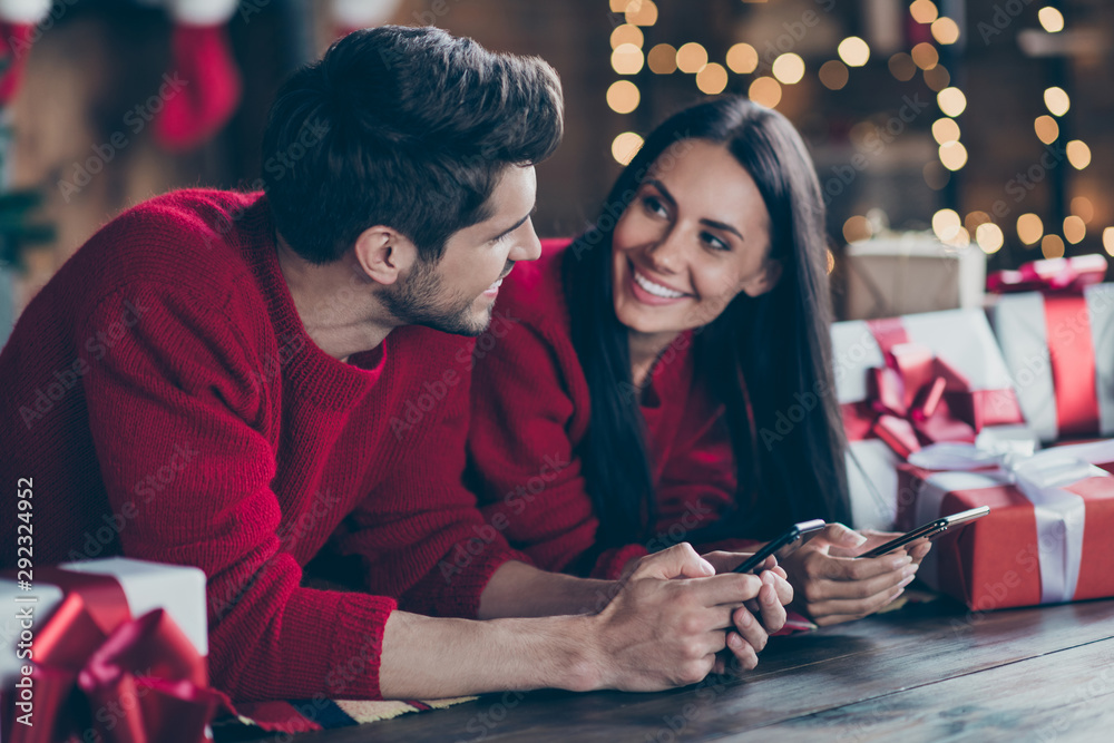 Close up photo of two romantic married people use cell phone feel ...