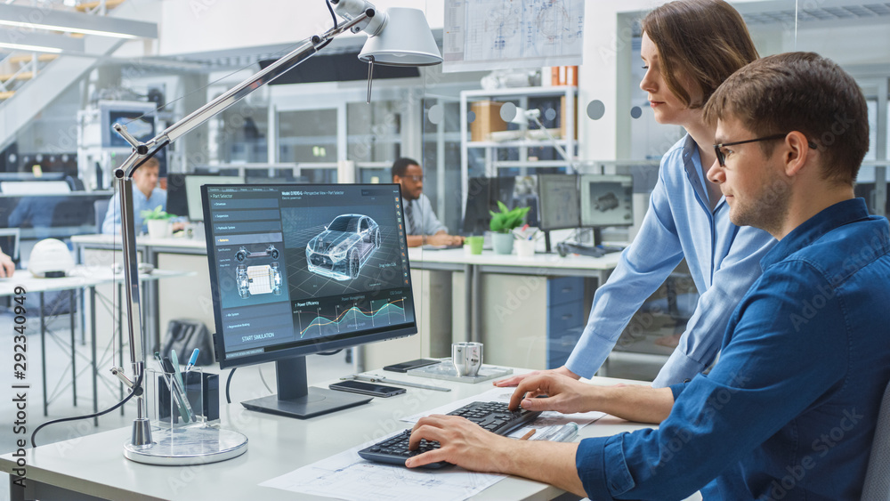 Engineer Talking With Project Manager and Working on Desktop Computer ...