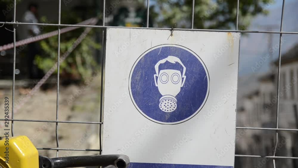 Sign for a dust protection mask. White gas mask on blue background ...