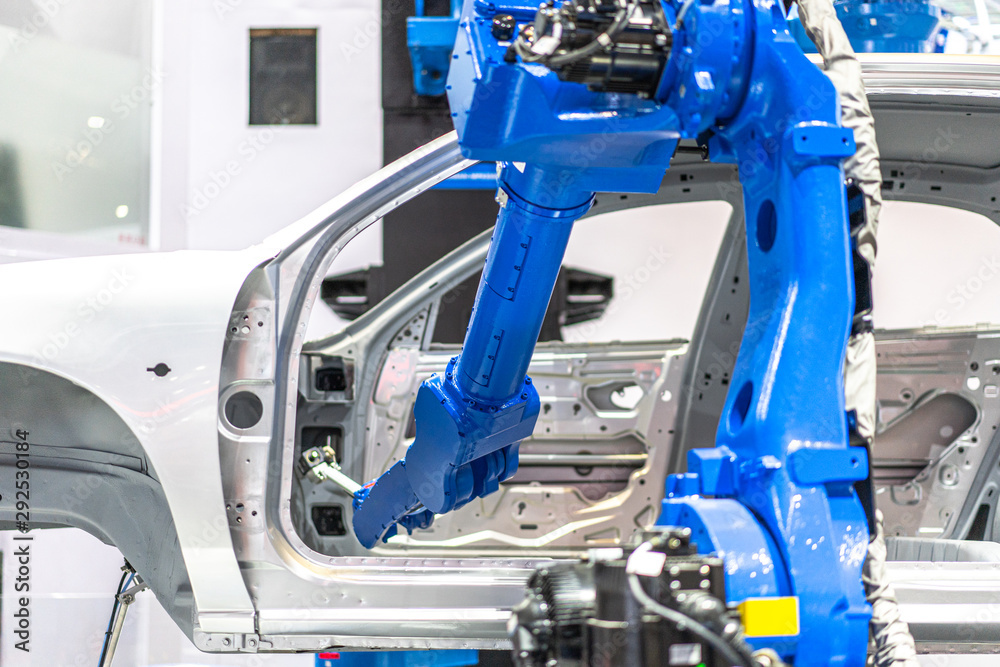 robot arm in factory Stock Photo | Adobe Stock