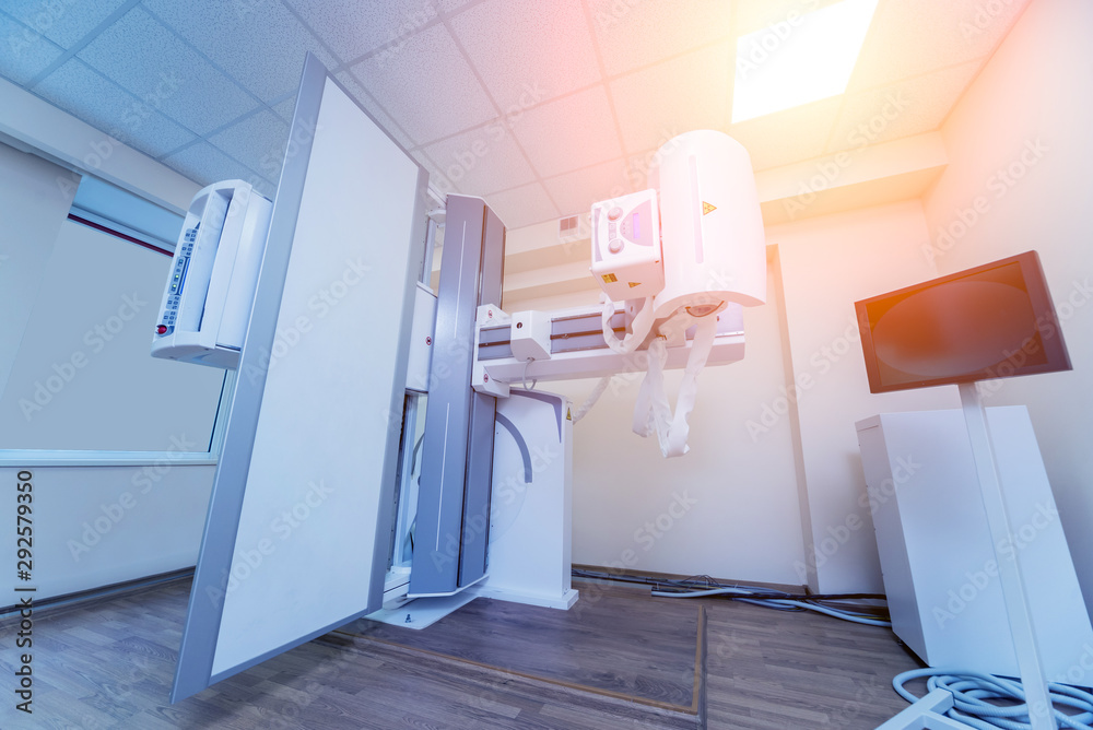 X-ray room in a hospital. Classic ceiling-mounted x-ray system. Stock ...