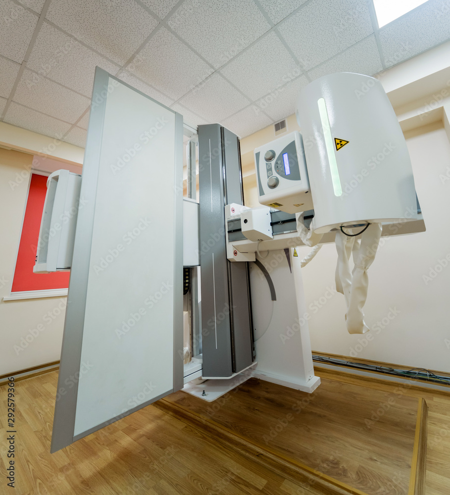 X-ray room in a hospital. Classic ceiling-mounted x-ray system. Stock ...