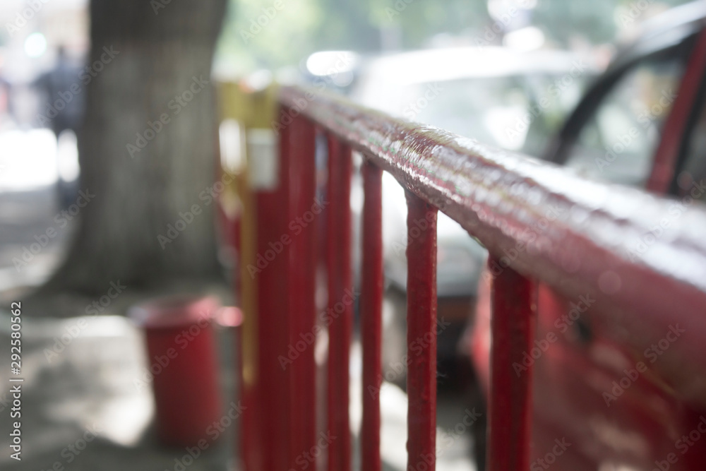 Red handrails on the street. Daytime photo of red Soviet handrails on ...