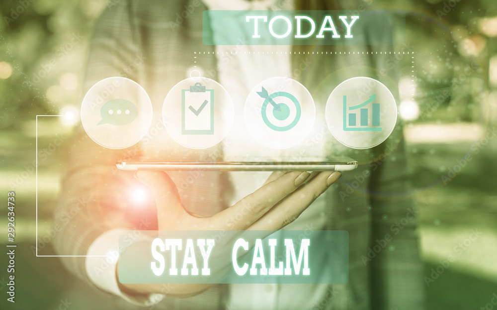 Text sign showing Stay Calm. Business photo showcasing Maintain in a ...