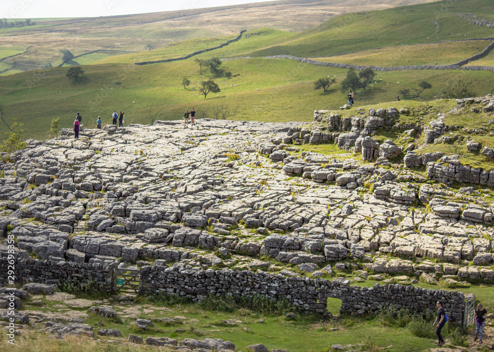 Naklejka The famous limestone pavement above Malham Cove from which ...