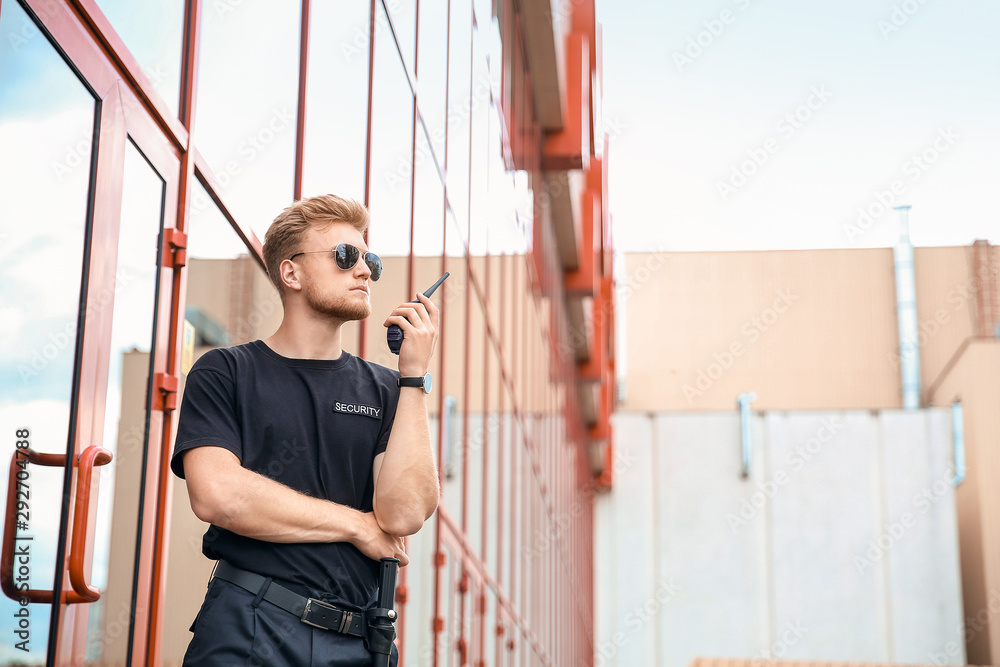 Handsome male security guard outdoors Stock Photo | Adobe Stock