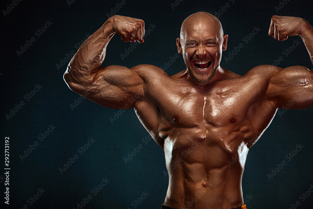 Bodybuilding competitions on the scene. Handsome and fit man sportsmen ...