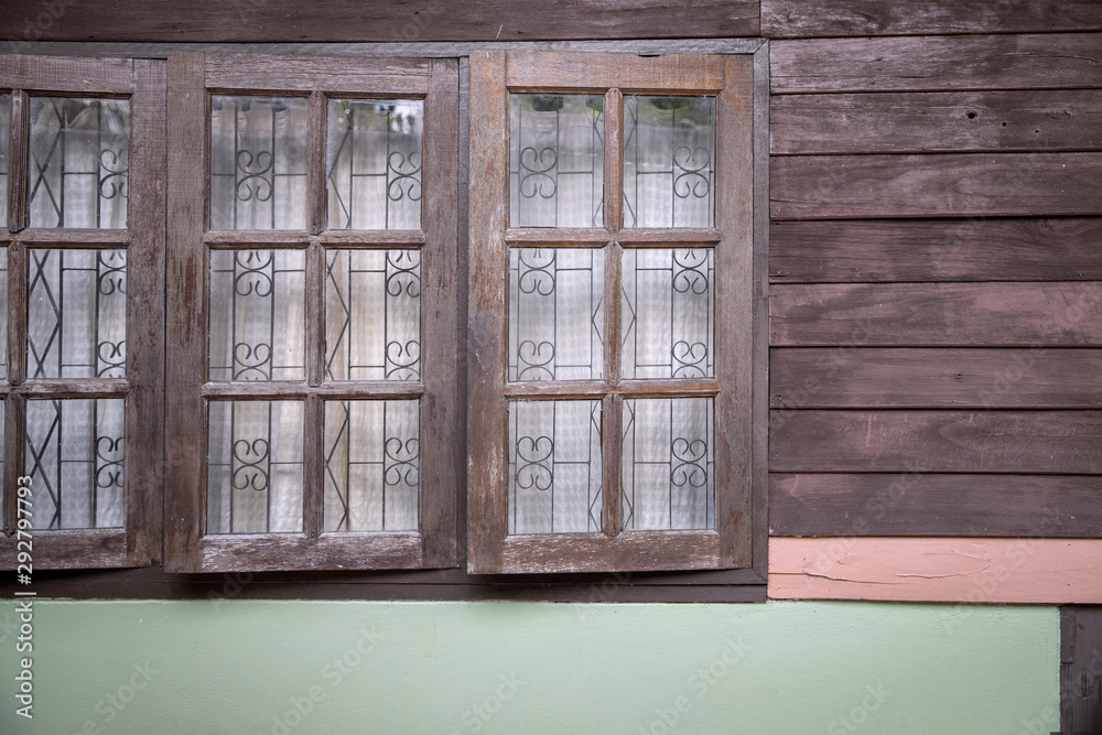 Old vintage wood window on old wooden wall outside at country home ...