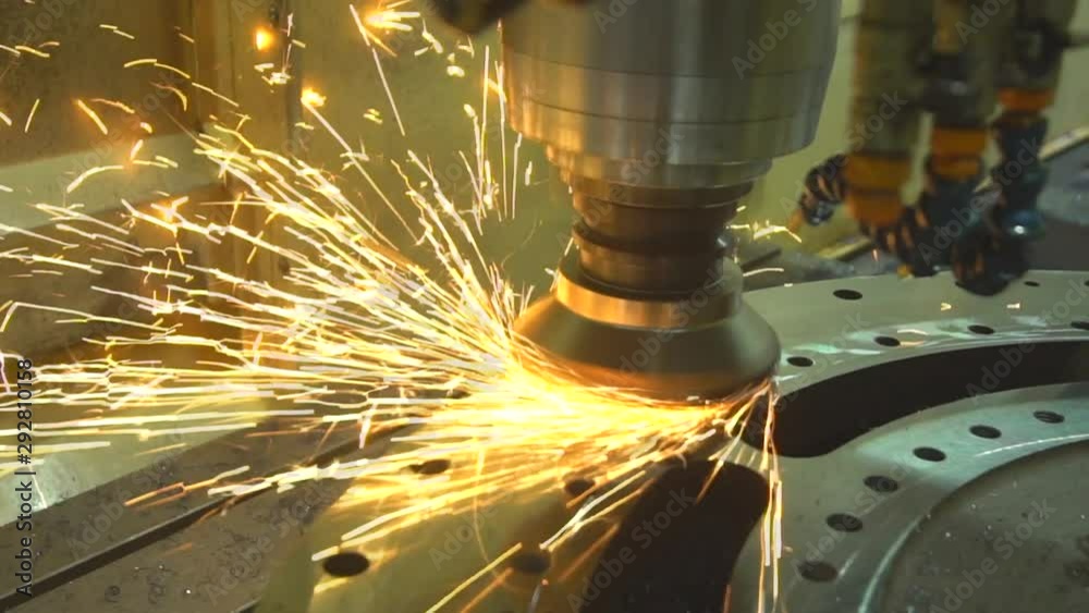 Close-up shot of CNC machine automated milling machine doing precise ...