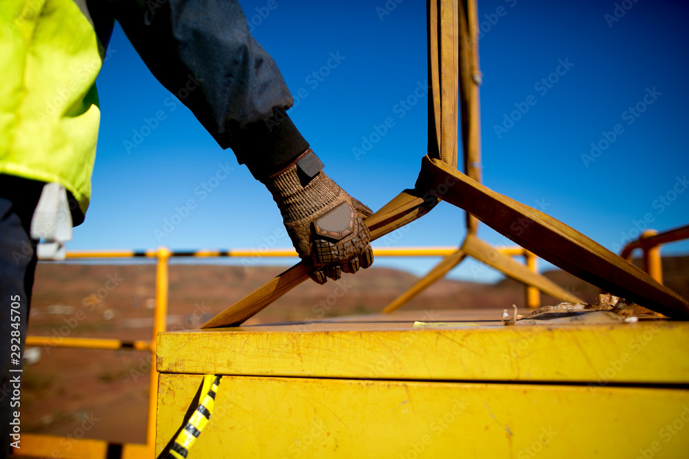 Rigger hand construction worker wearing heavy duty glove holding safety ...