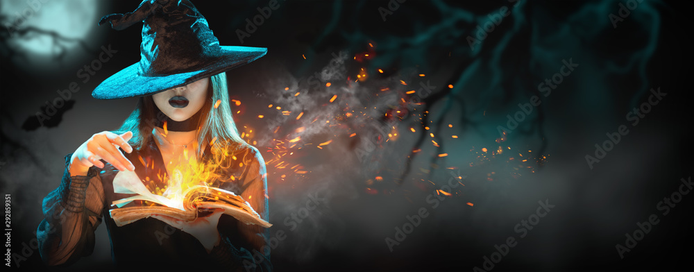 Halloween Witch girl with magic Book of spells portrait. Beautiful ...