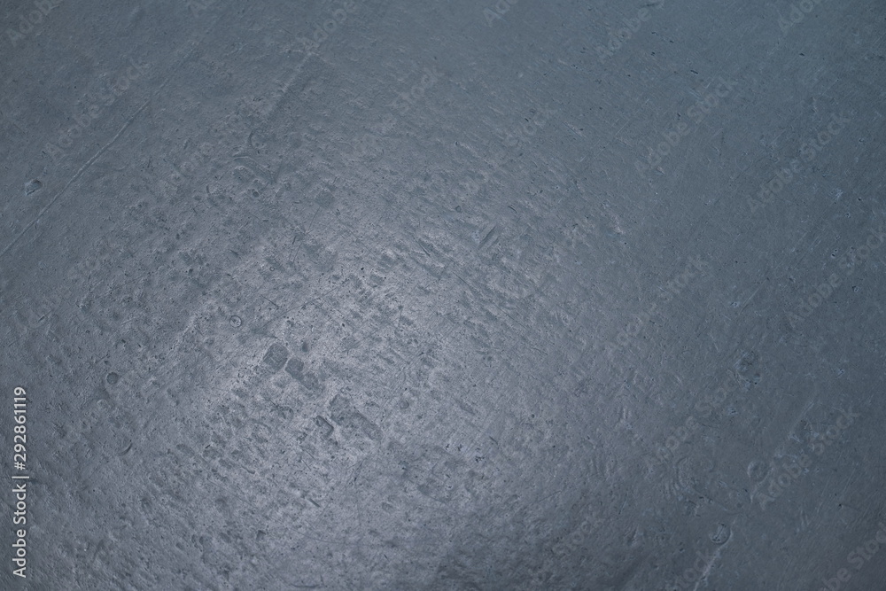 blue-gray-colored stone background or texture; Surface of the golden ...