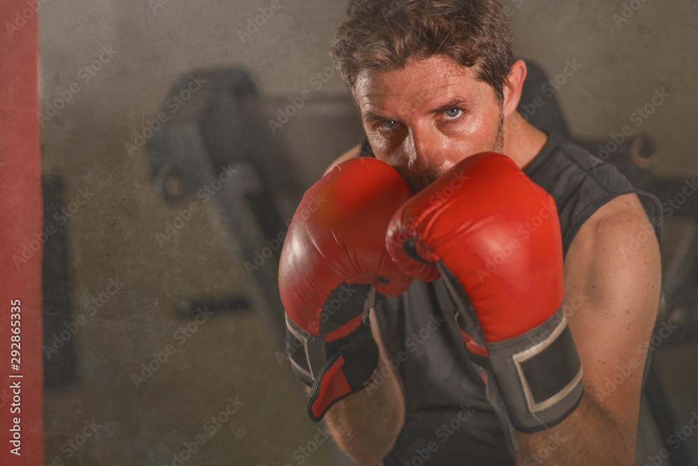 gym workout portrait of attractive and fierce looking boxer man 30s to ...