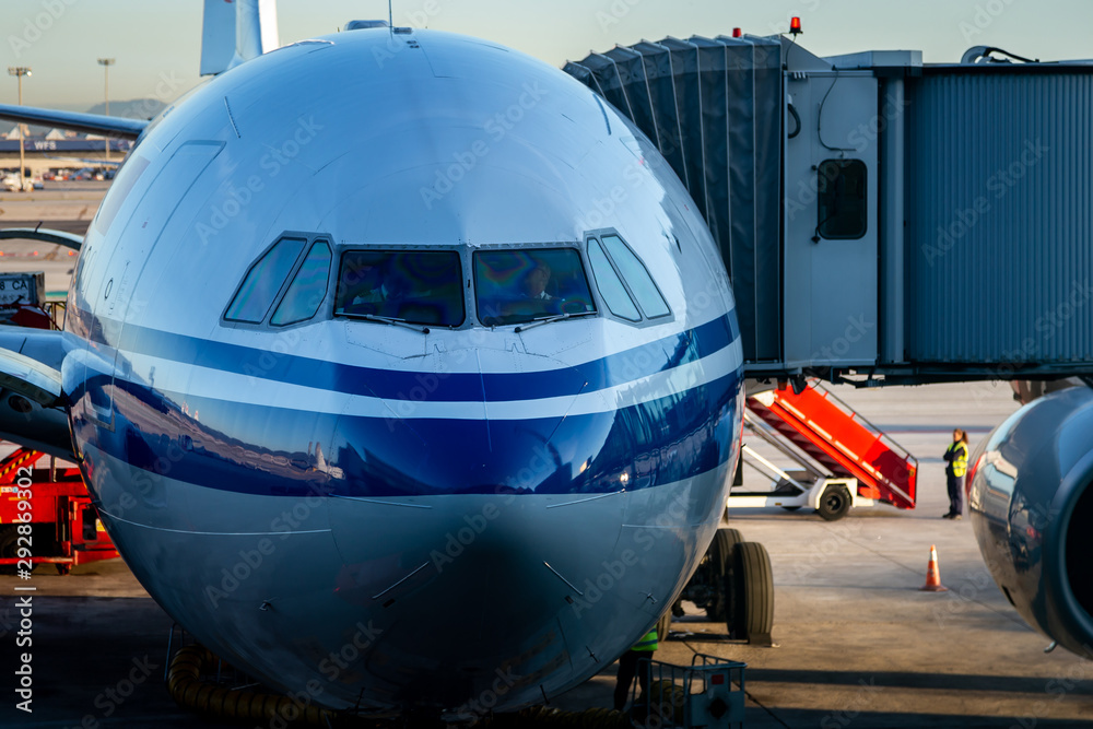 Front view of aircraft cabin or cockpit with finger connected waiting ...