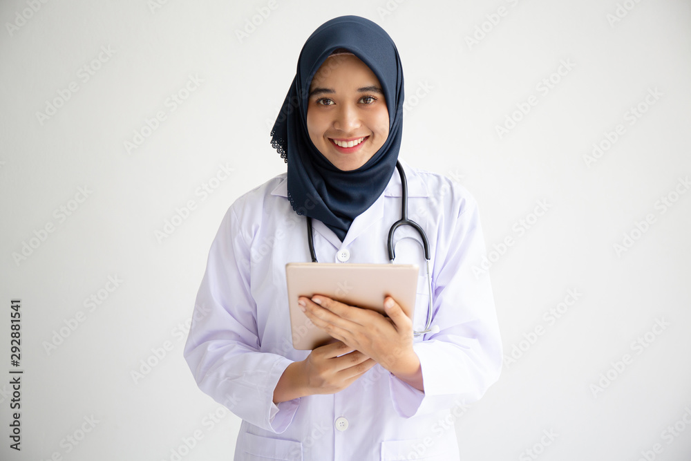 Young Arab Muslim intern doctor women smile on isolate white background ...