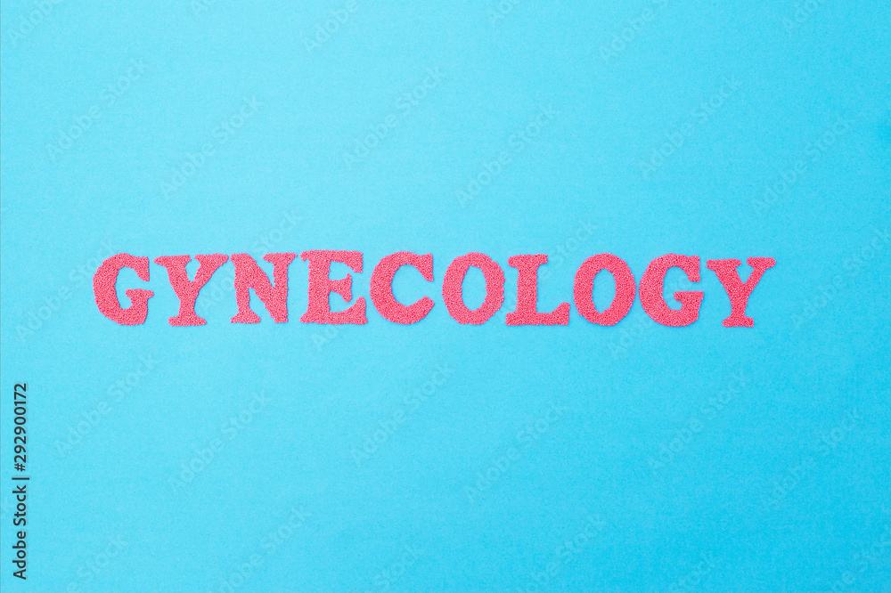 Gynecology inscription in red letters on a blue background. The concept ...