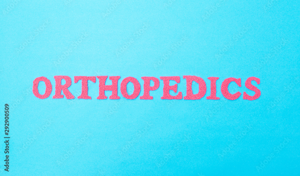 Orthopedics inscription in red letters on a blue background. The ...