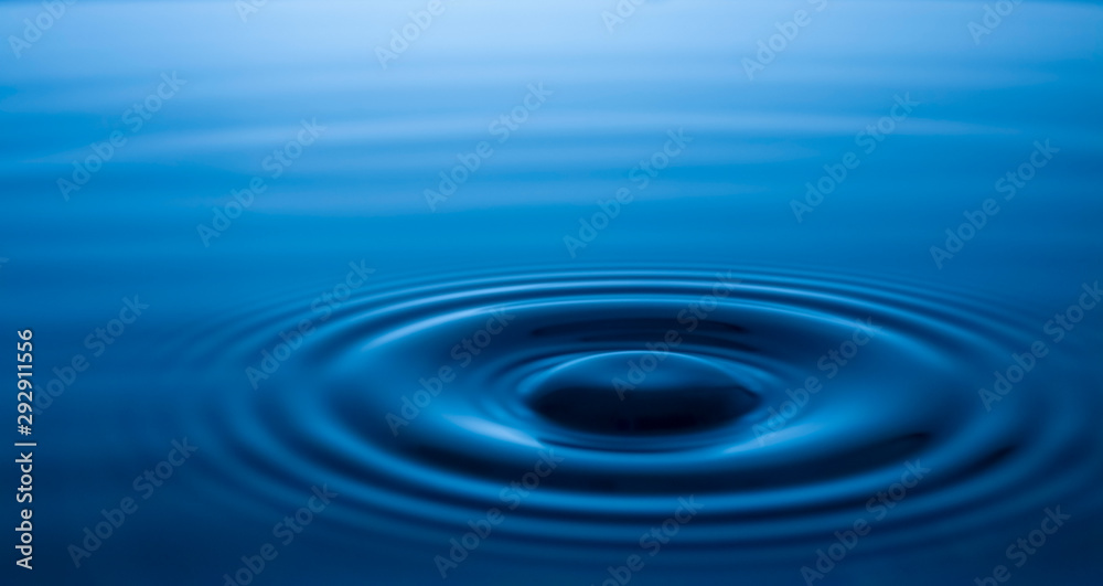 Water surface with waves Caused by the impact of water droplets. The ...