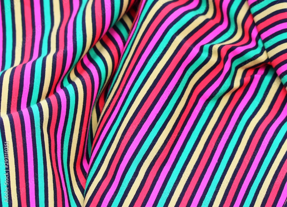 Colorful detailed fabric textures of different cloth types in a close ...