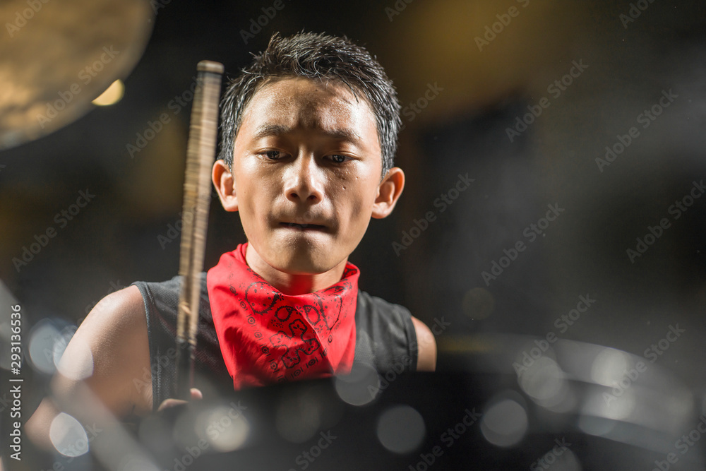 Foto de young boy as talented rock band drummer . portrait on stage of ...