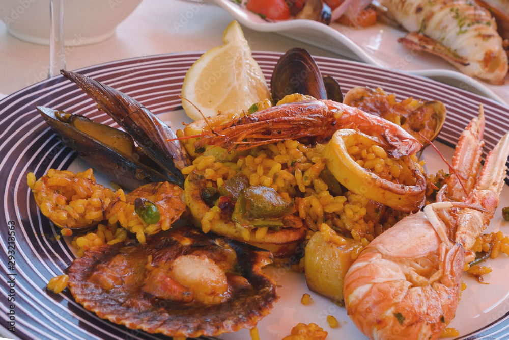 A traditional popular Spanish seafood paella dish. Mussels, Amandi and ...