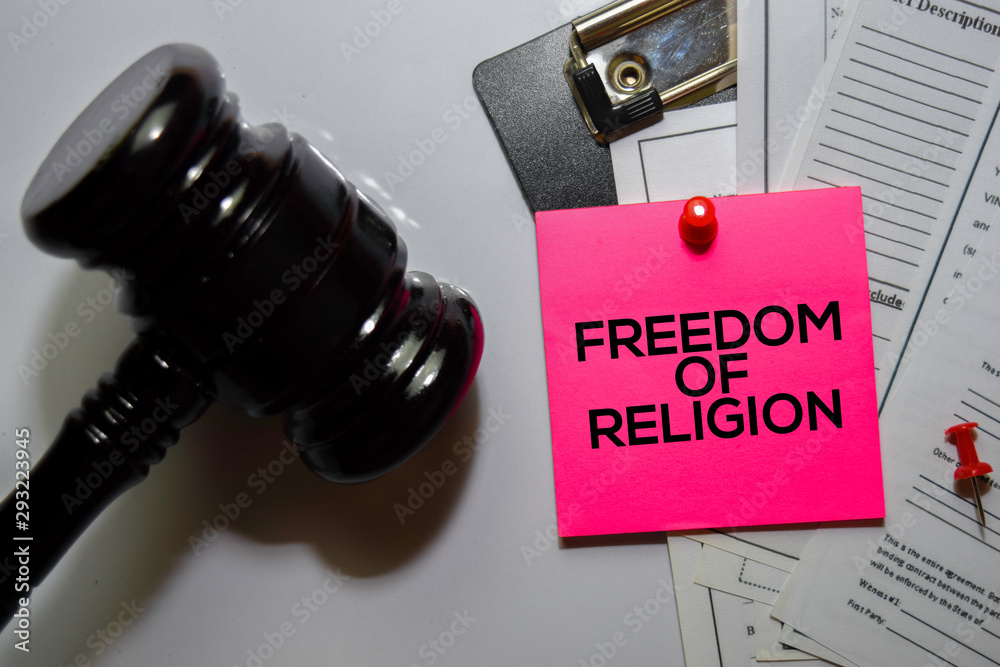 Freedom of Religion text on sticky notes and gavel isolated on office ...
