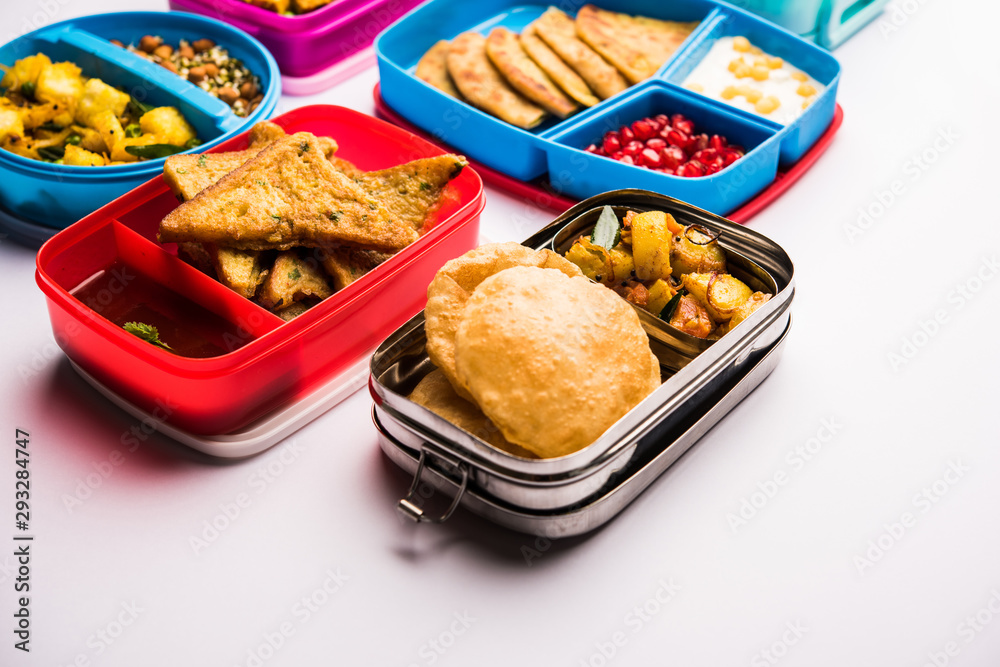 group of Lunch Box / Tiffin for Indian kids, showing variety or ...
