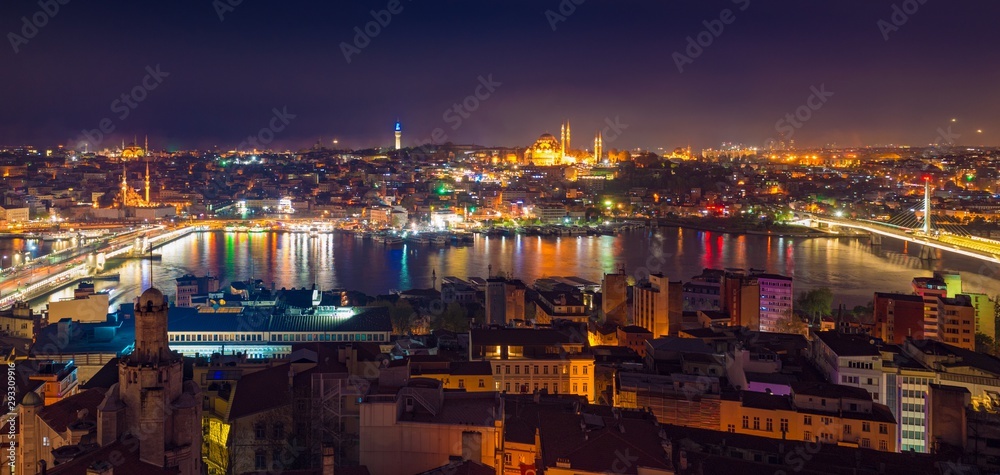 Aerial panoramic night view of Golden Horn inlet and illuminated ...
