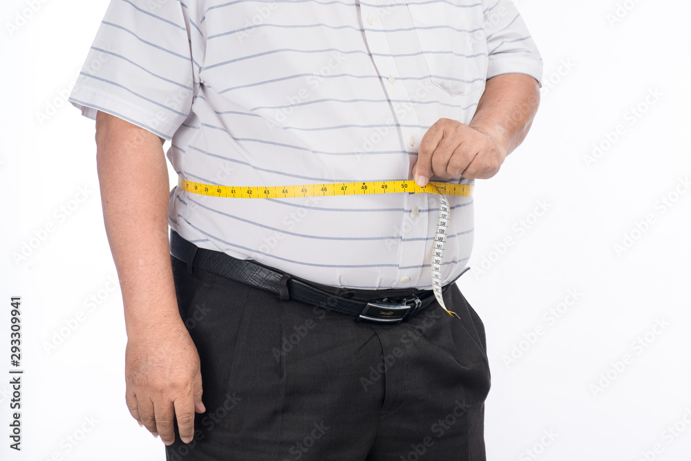 Fat mature man measuring his belly with measurement tape, isolated on ...