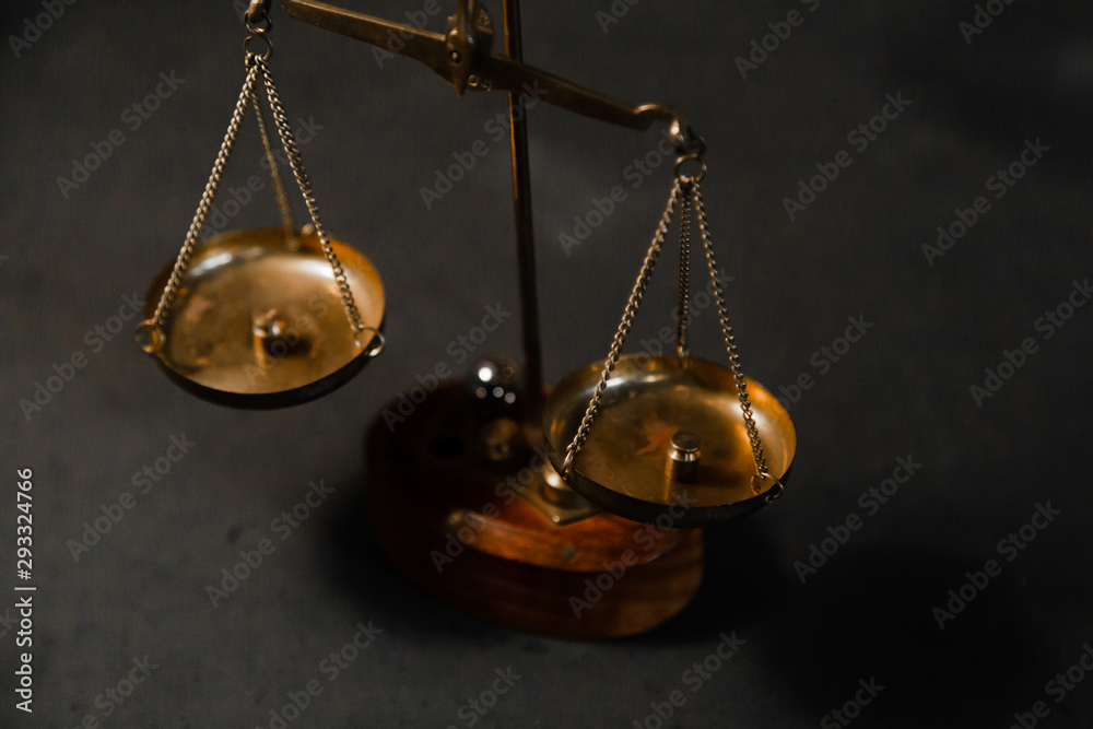 Old gojd scales for weighing little things. Symbol of law and scales of ...