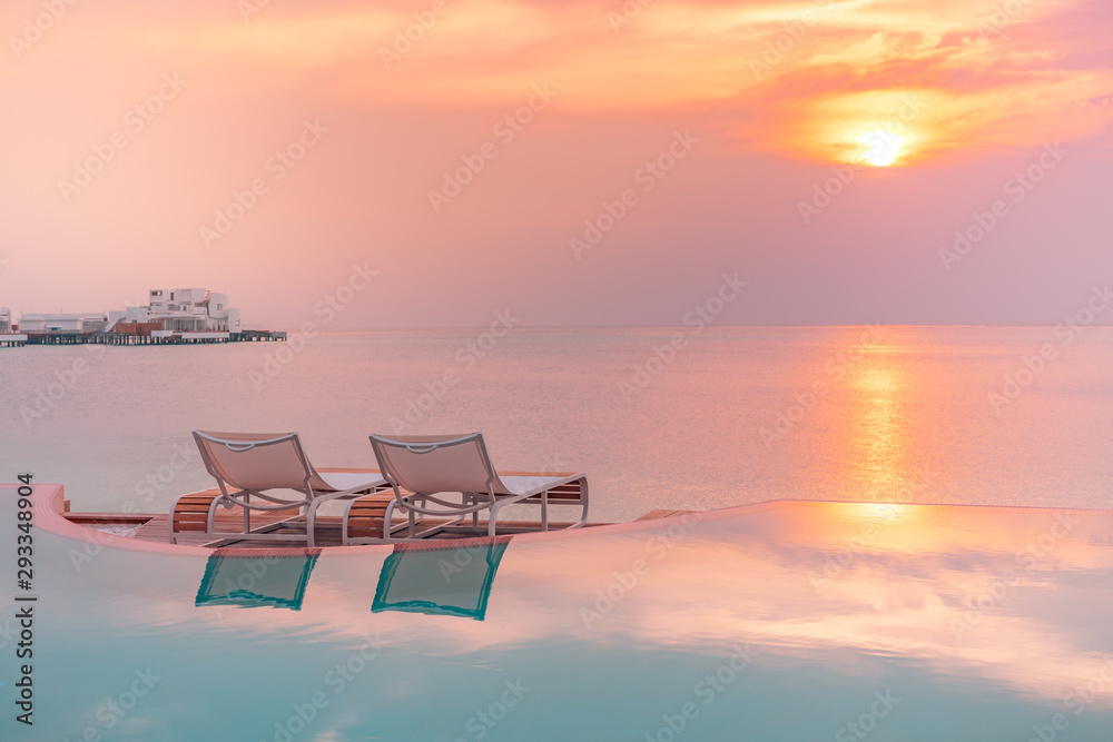 Perfect vacation background of infinity pool reflection with loungers ...
